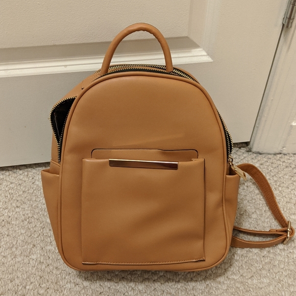 Bags | Four Pocket Tan Minibackpack Used Once | Poshmark